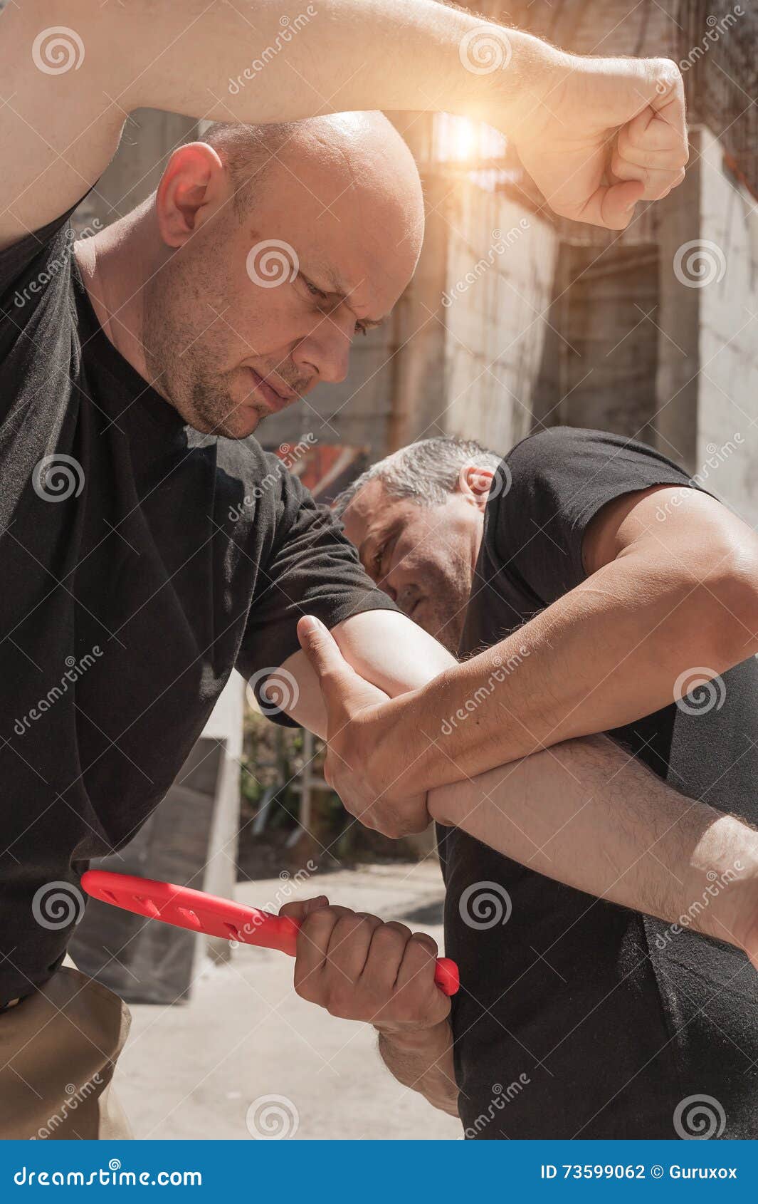 Self Defense Techniques Against a Knife Attack Stock Photo - Image of ...