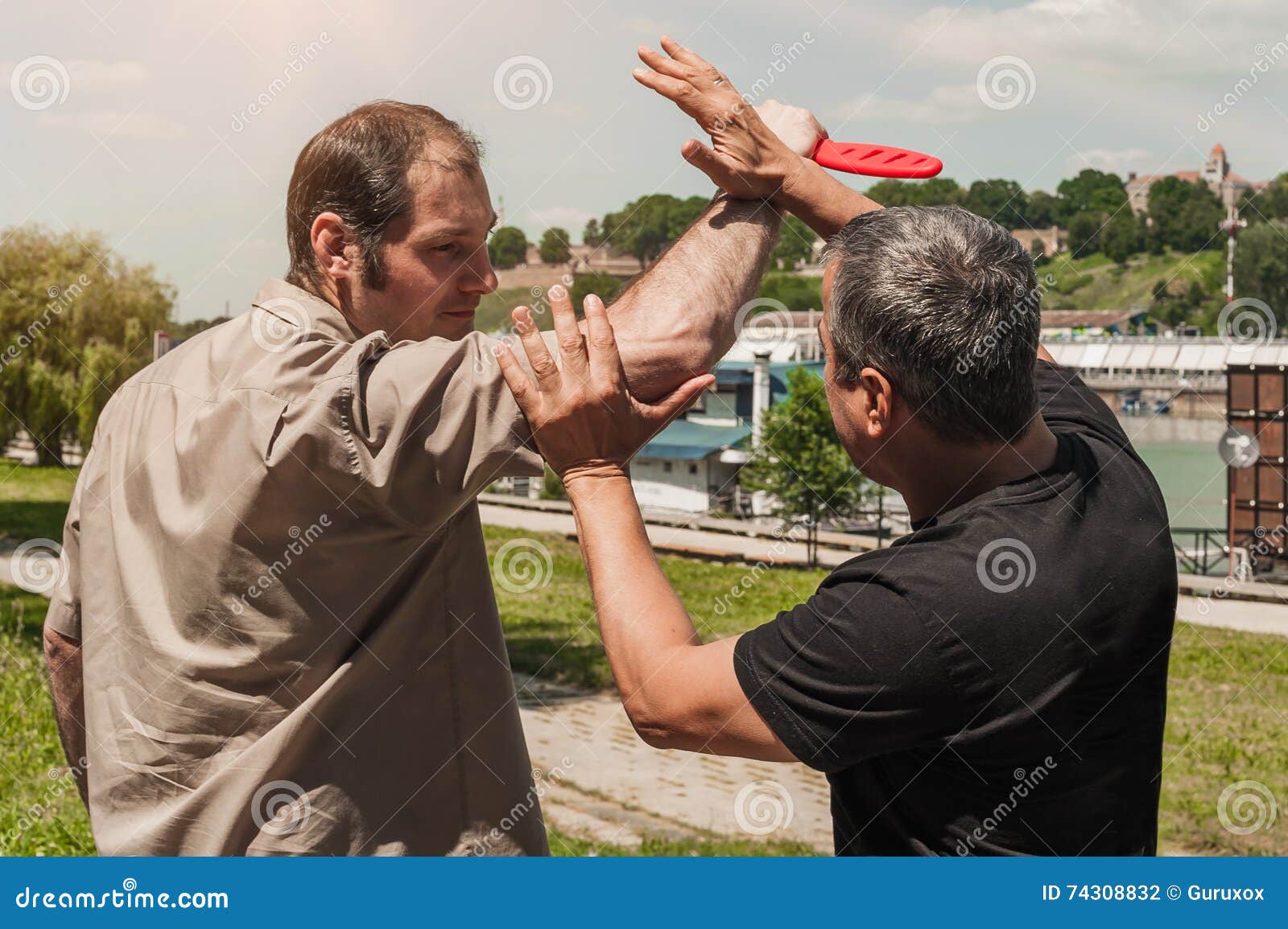 Self Defense Techniques Against a Knife Attack Stock Photo - Image of ...