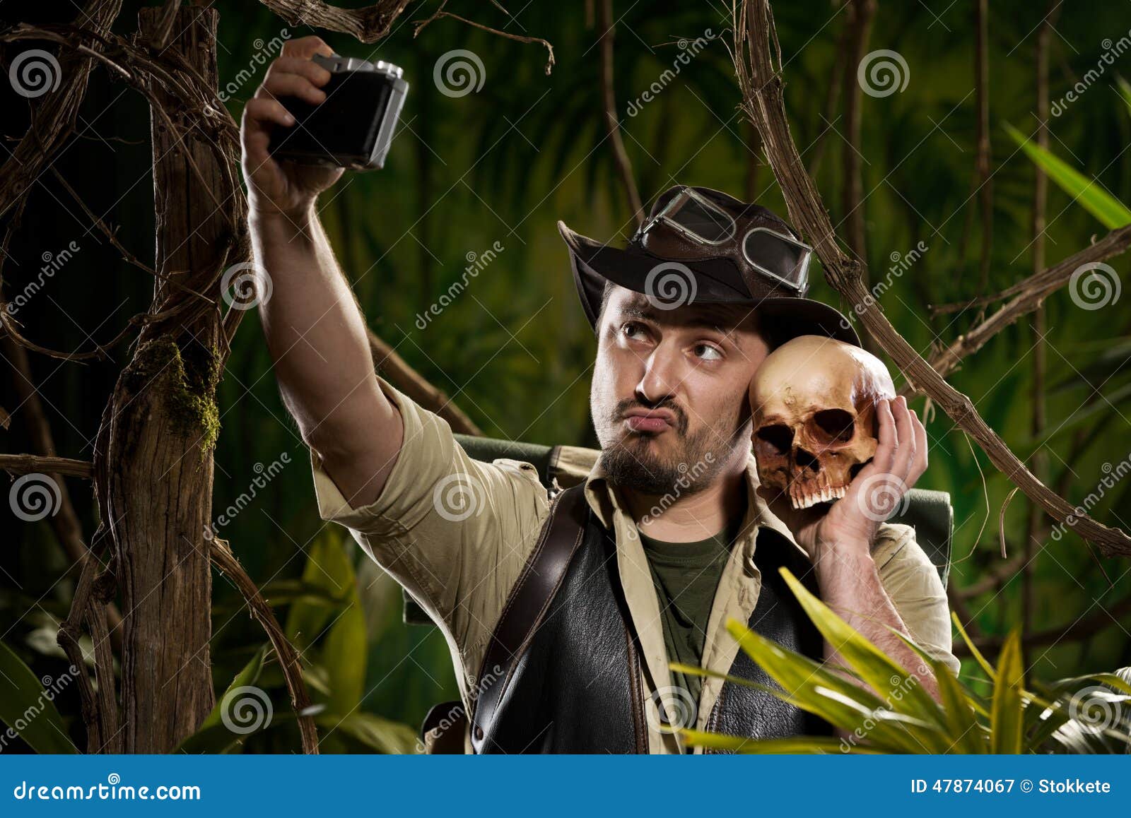 Self portrait with skull stock image. Image of camera - 47874067