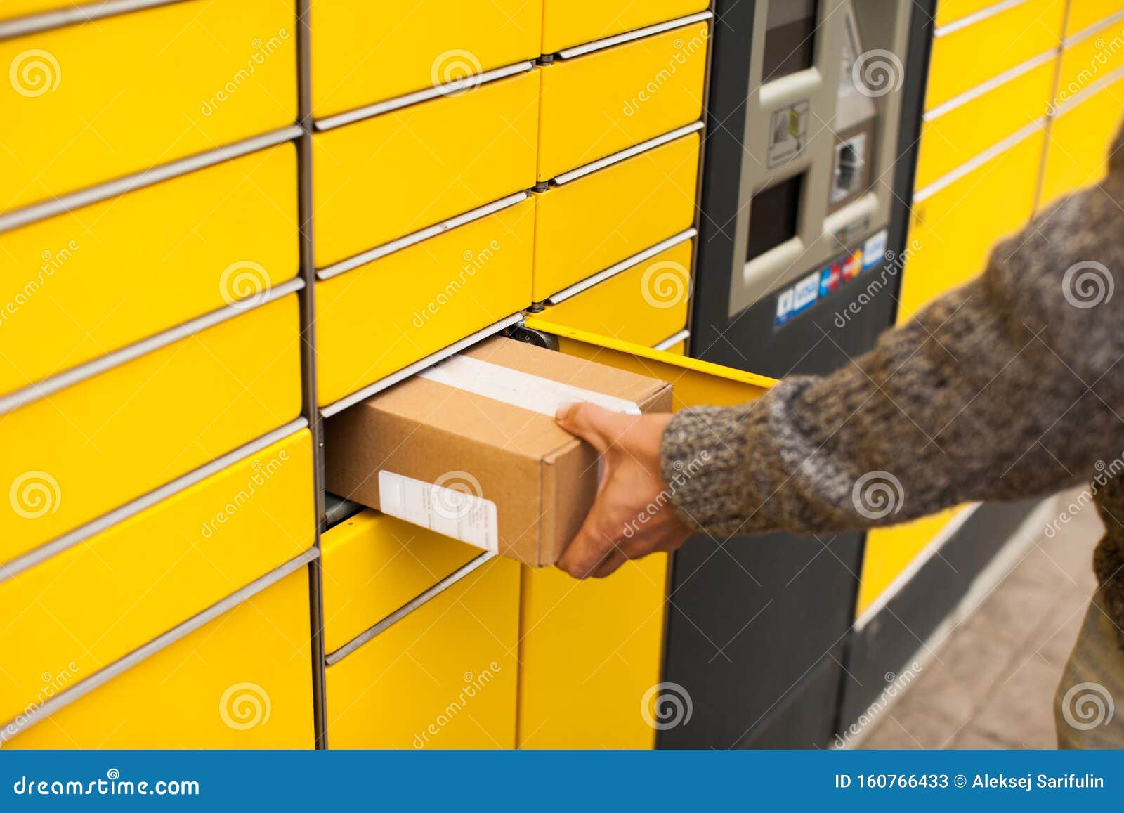 Self-service Post Terminal Machine. Man Recieve a Parcel Stock Image ...