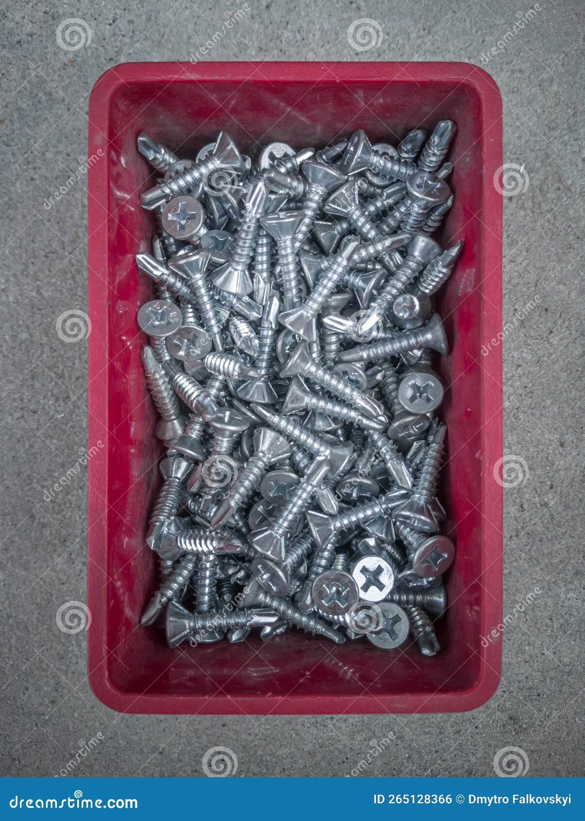 Self-tapping Screws in a Red Plastic Box, Close-up Top View, Flat Frame ...