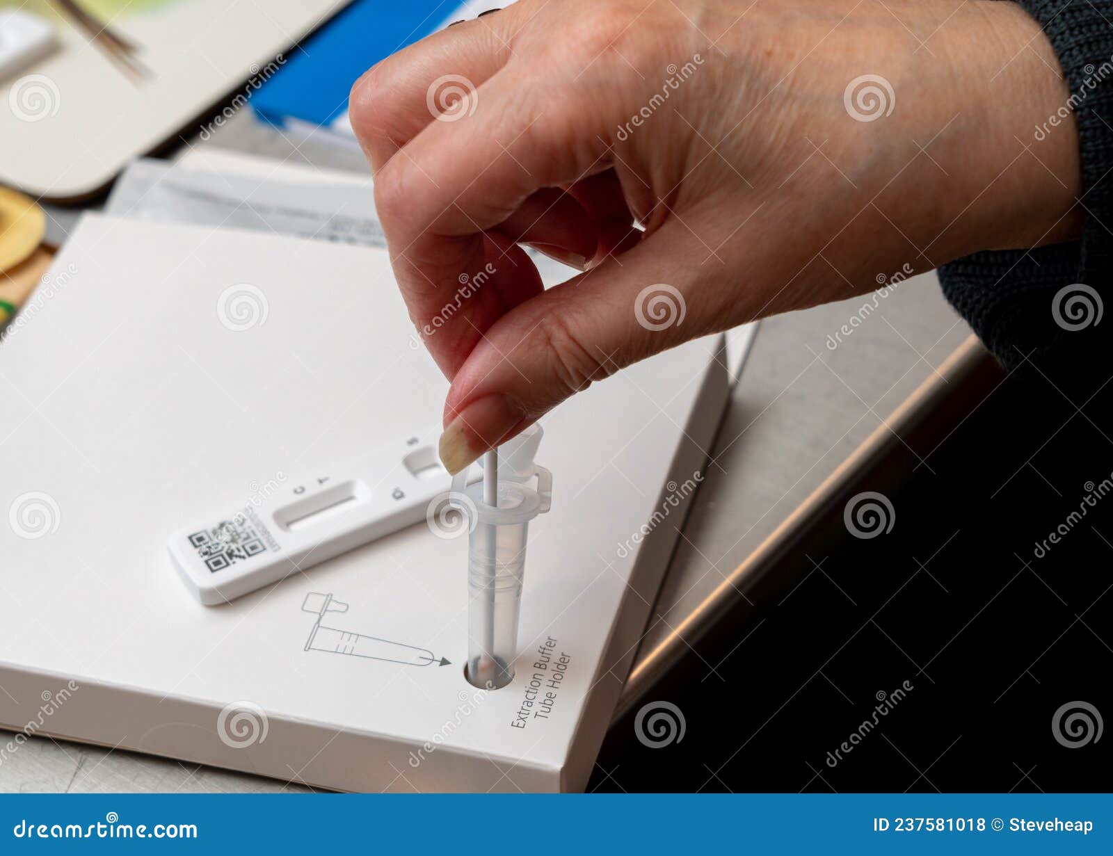 Self-test Kit for Covid-19 with Swab Being Flushed in Buffer Stock ...
