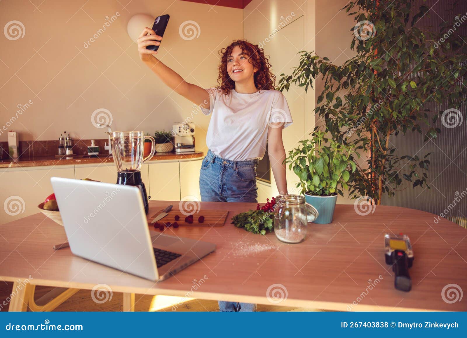 Curly-haired Young Girl Making Selfie in the Kitchen Stock Photo ...