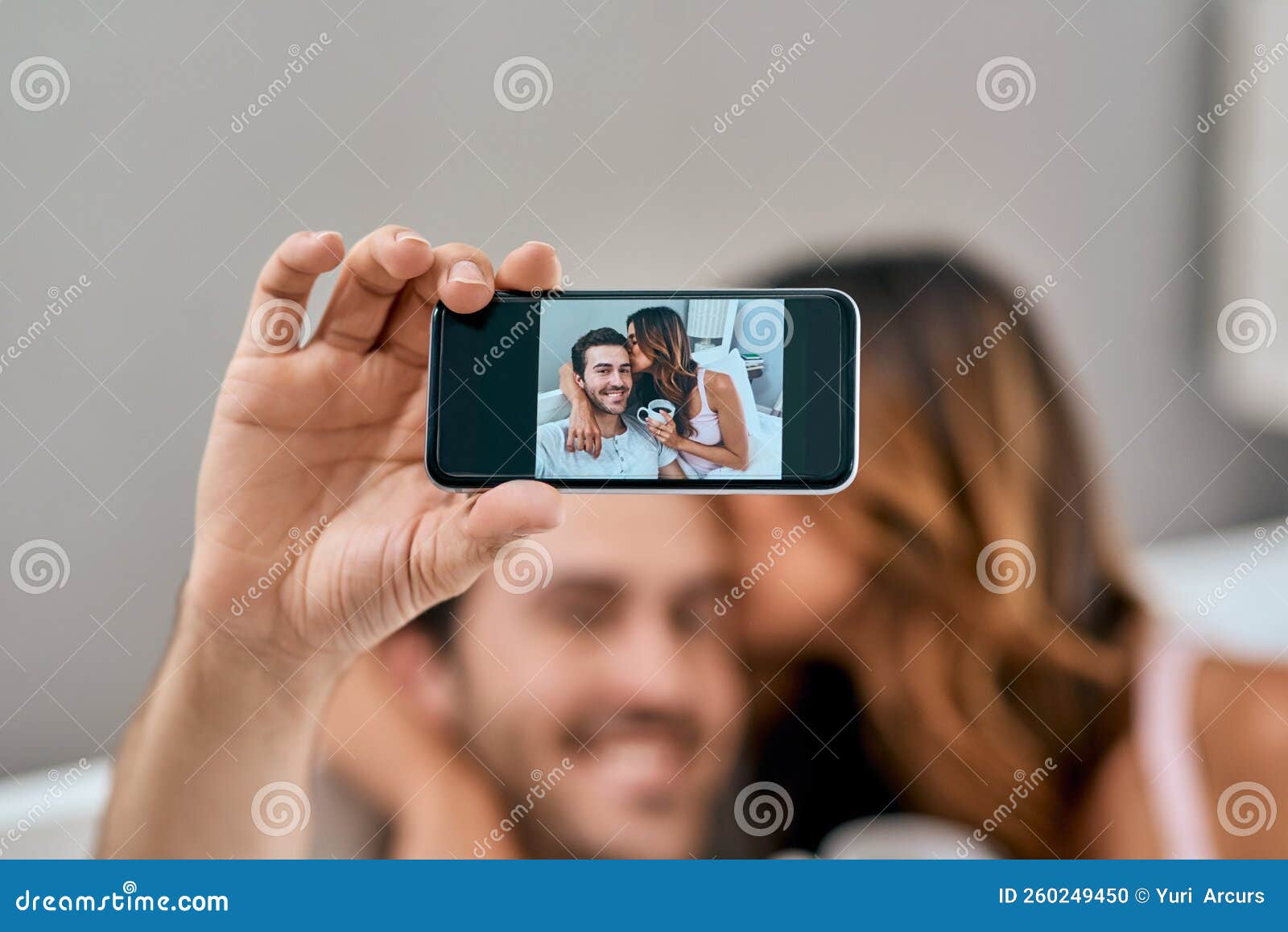 Selfies To Showcase Their Love A Loving Young Couple Taking Selfies