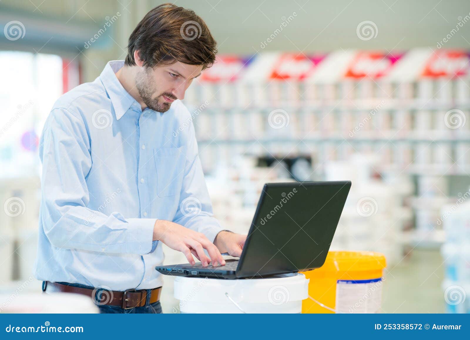 Seller Assistant Choosing Laptop Computer Stock Photo - Image of ...