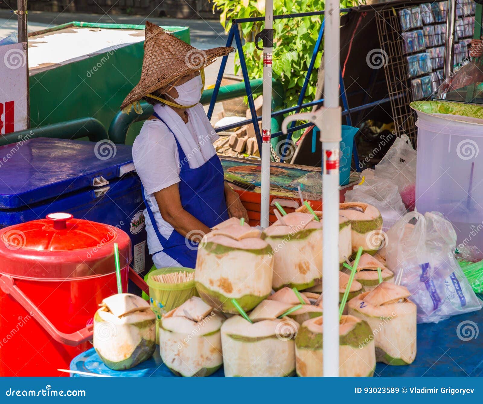 The seller of coconuts editorial stock image. Image of seller - 93023589