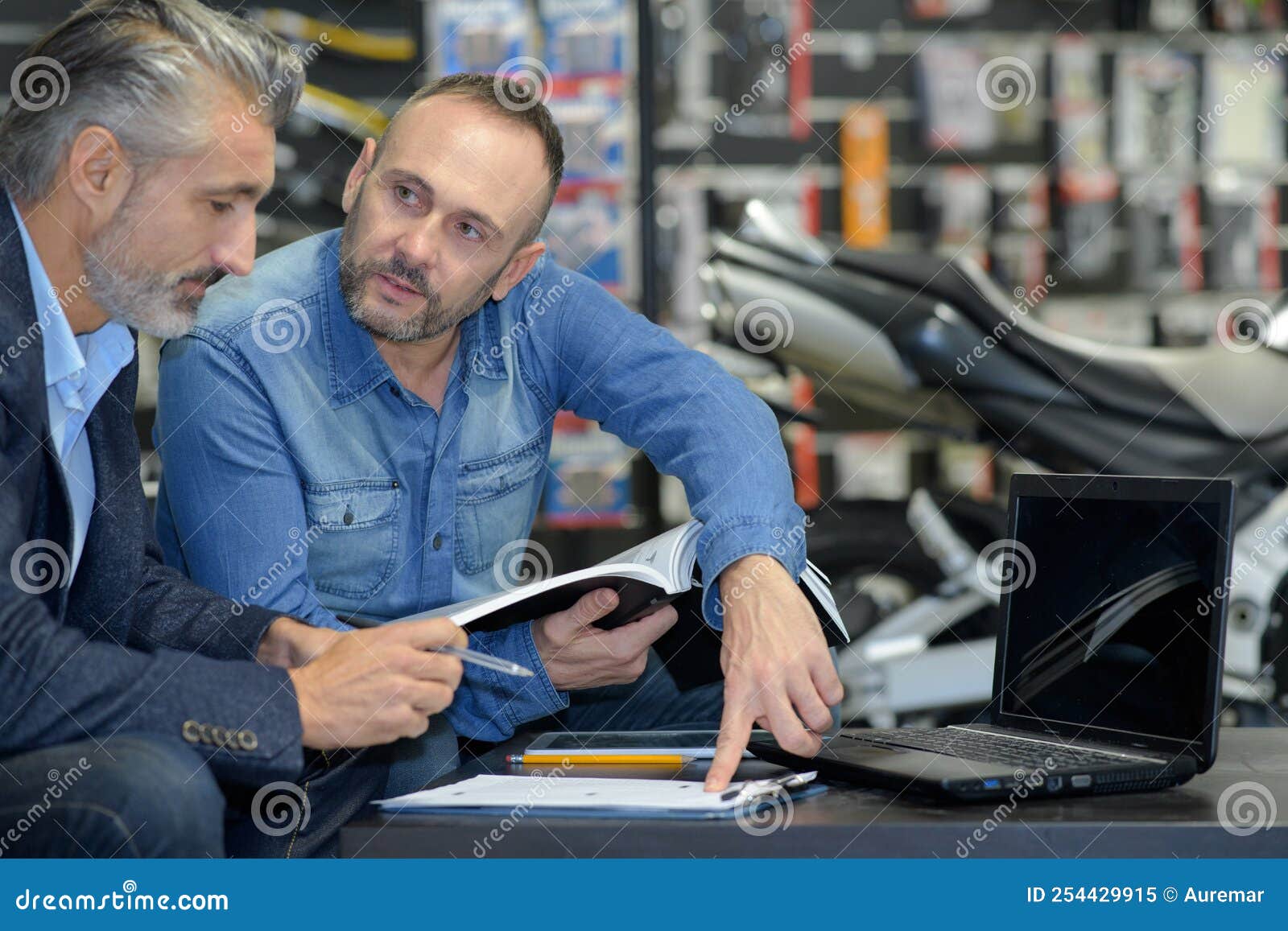 Seller and Customer Talking in Motorcycle Store Stock Image - Image of ...