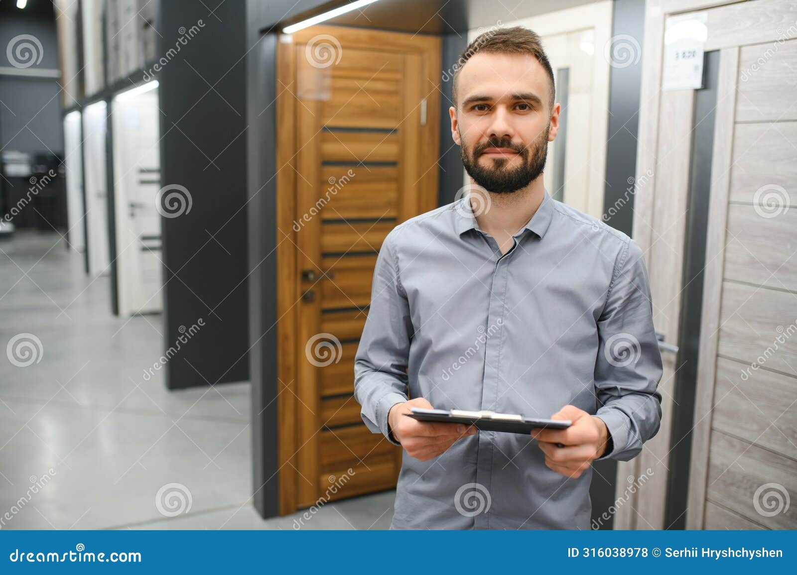 Seller of Doors in a Hardware Store. Home Repair Concept. Stock Photo ...