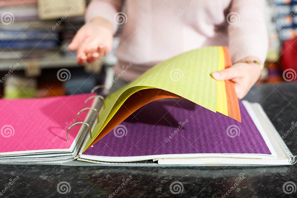 Seller with Fabric Specimens Folder Stock Photo - Image of dark, seller ...