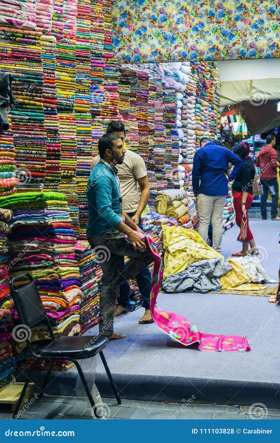 The Seller of Textiles in the Store Editorial Stock Photo - Image of ...