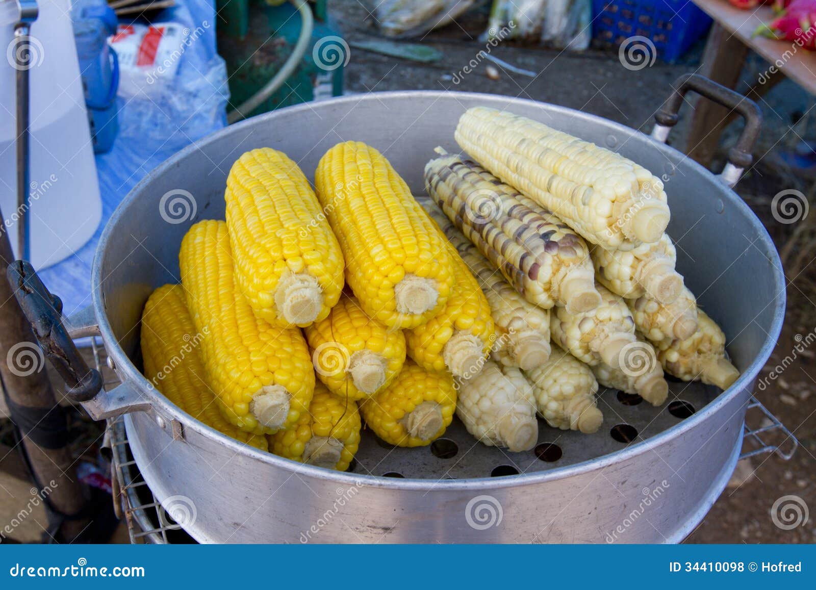Selling of Corn in a Market Stock Photo - Image of garlic, color: 34410098