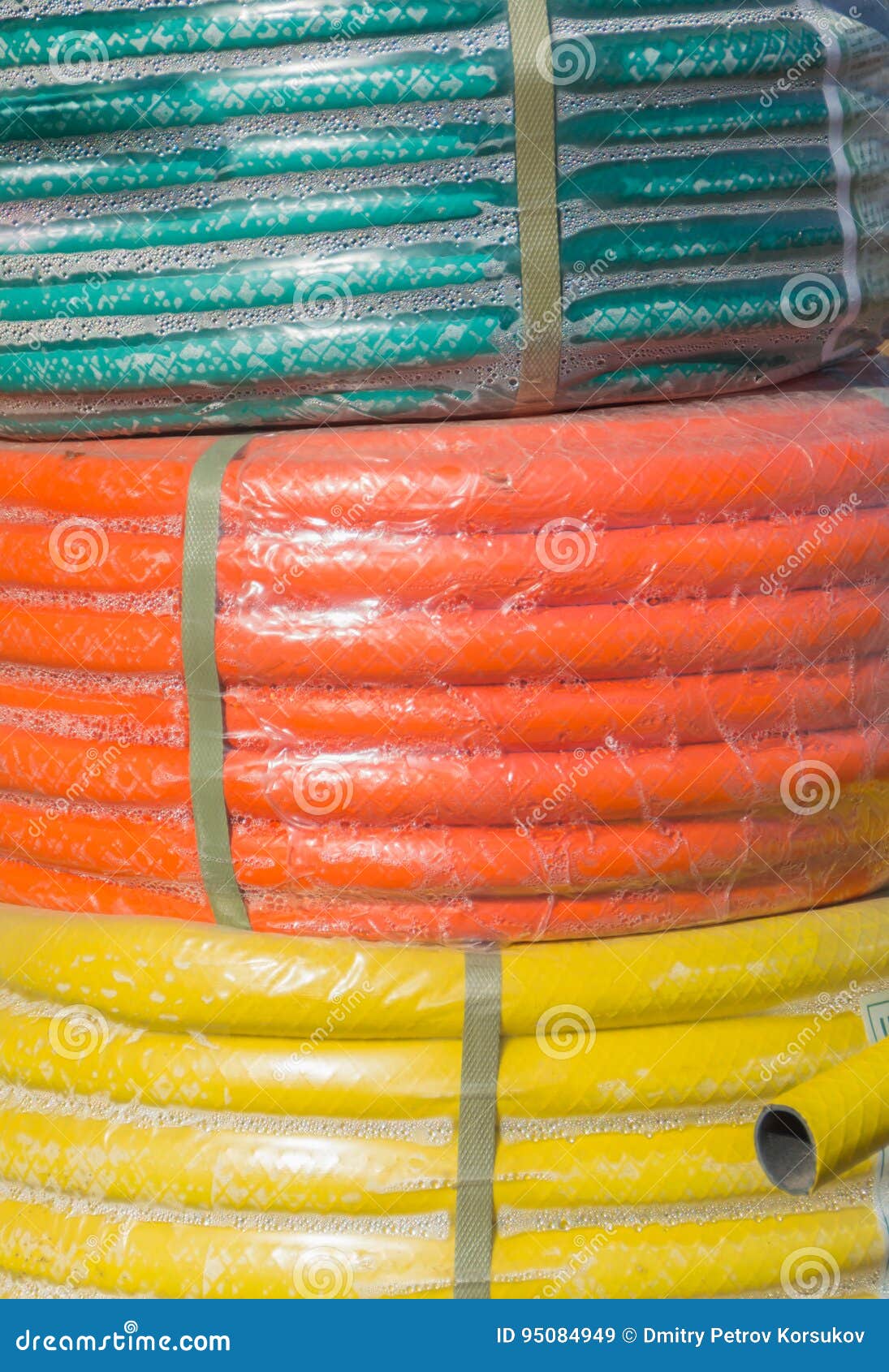 Selling Hoses of Different Colors, for Irrigation. Stock Image - Image ...