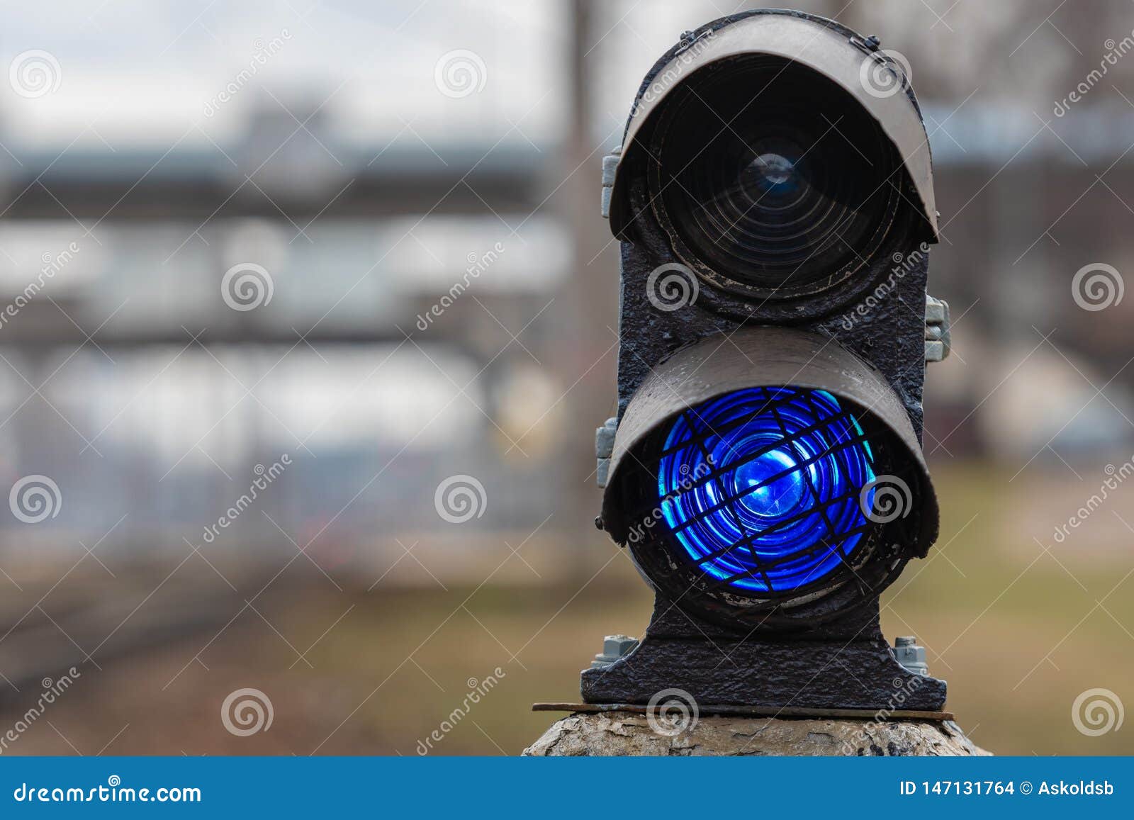 Semaphore with Burning Blue Light. the Intersection of Railway Tracks ...