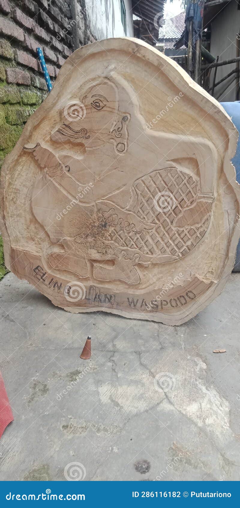 Semar mesem wood carving stock photo. Image of legend - 286116182