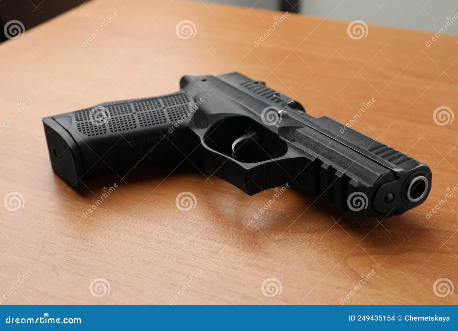 Semi-automatic Pistol on Wooden Table. Standard Handgun Stock Photo ...