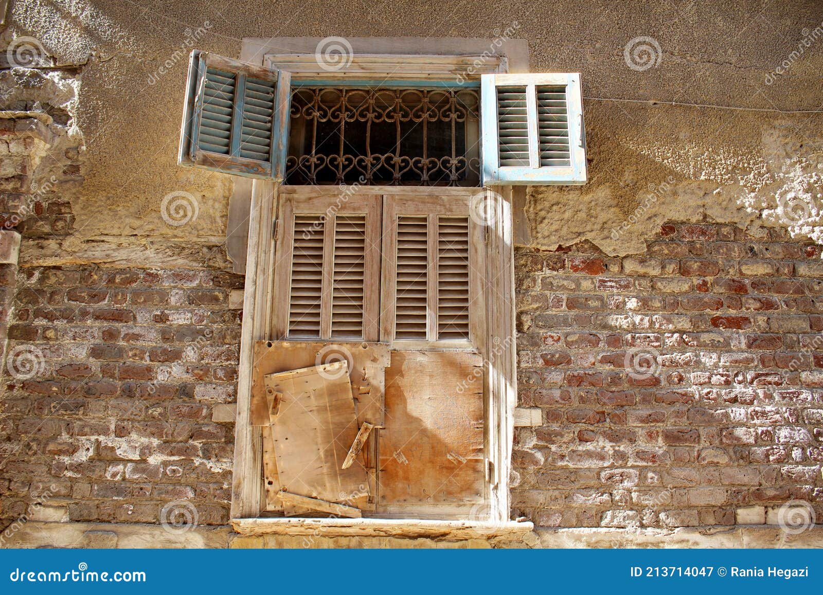 A Semi Open Shutter of an Old Wooden Window in Egypt Stock Image ...