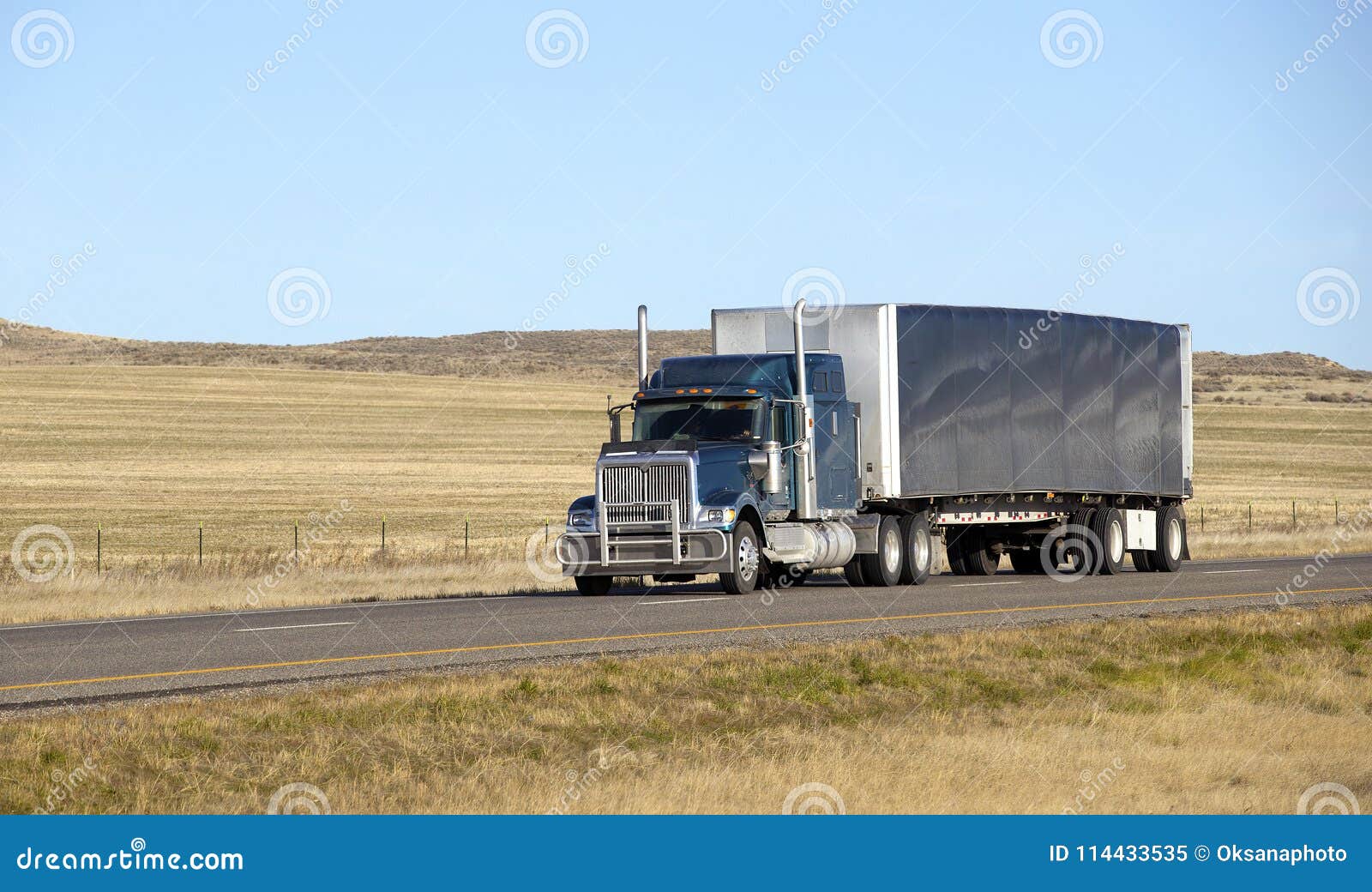 Truck With Trailer Delivered Blocks To Construction Site And Unloads A ...