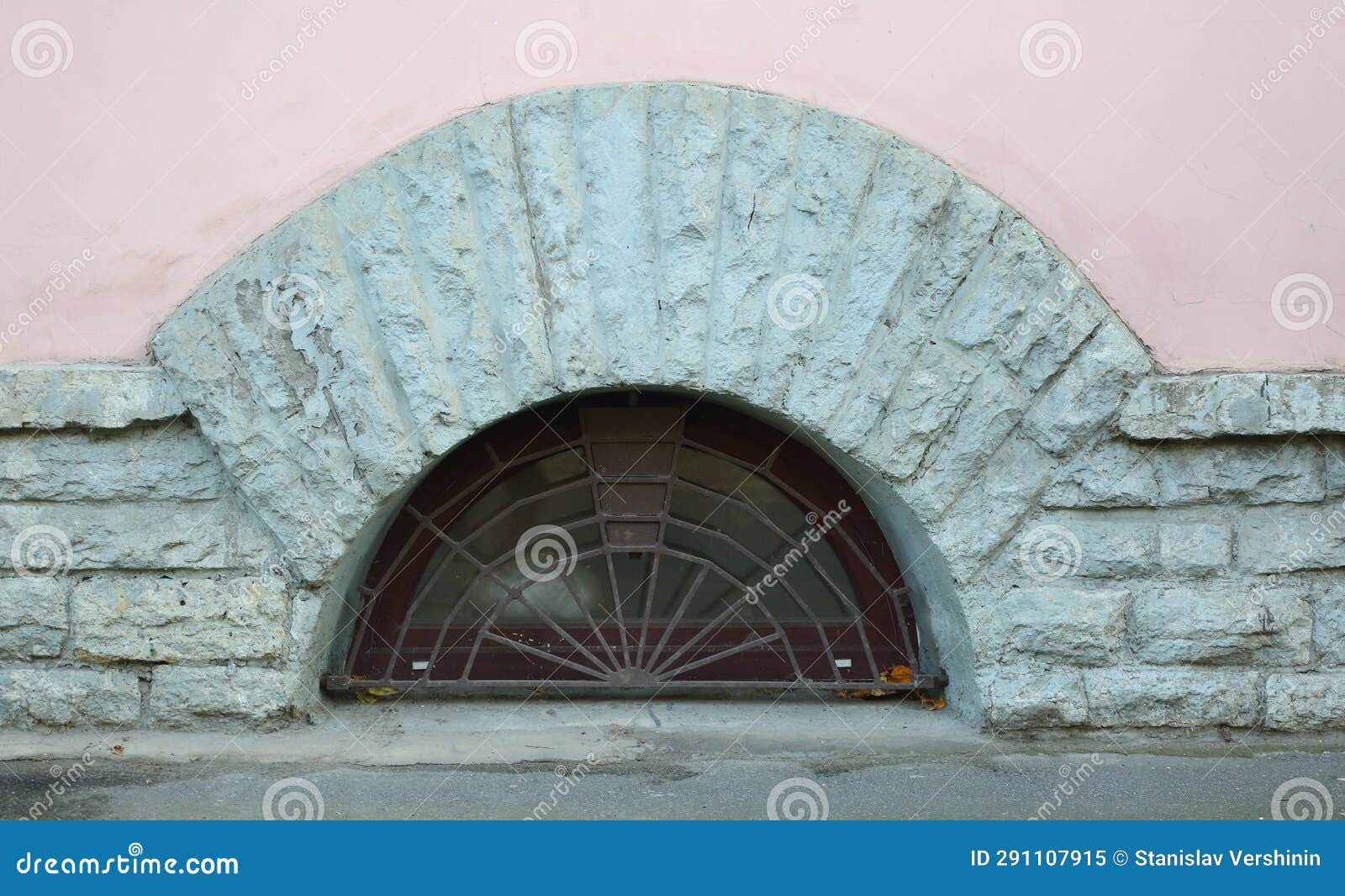 Semicircular Basement Window with Metal Barrier Stock Image - Image of ...