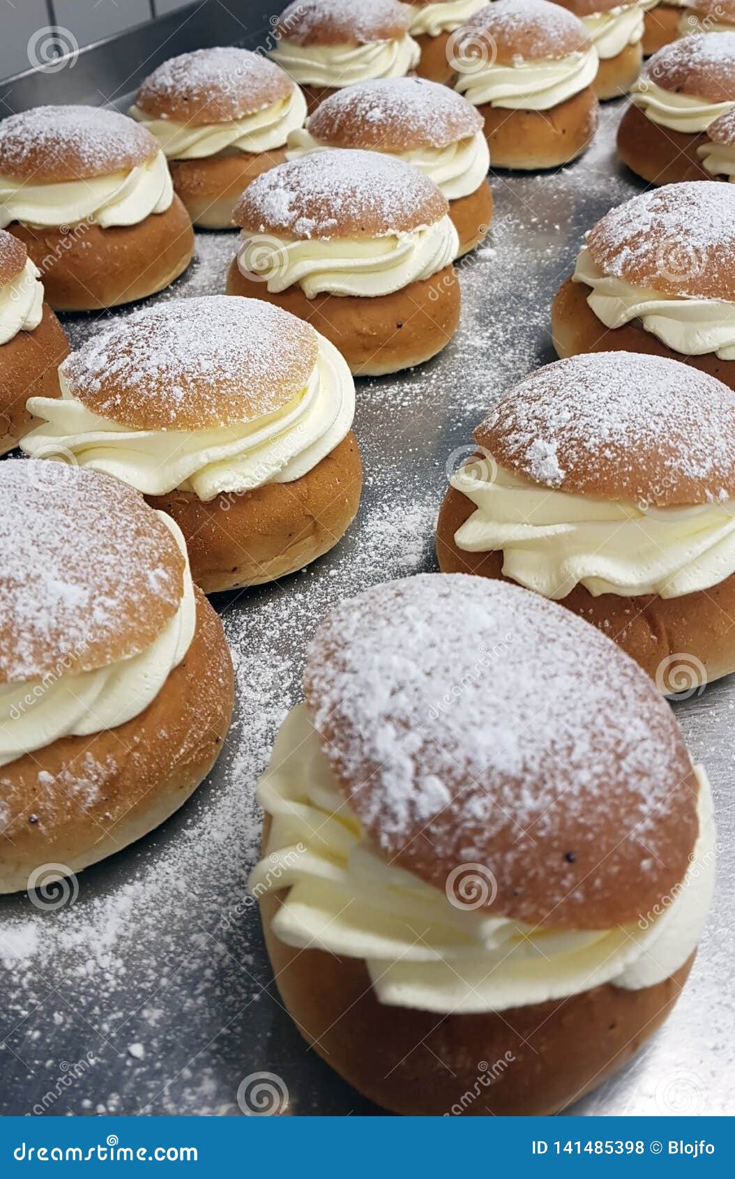 Semlor in rows stock photo. Image of flavoured, whipped - 141485398