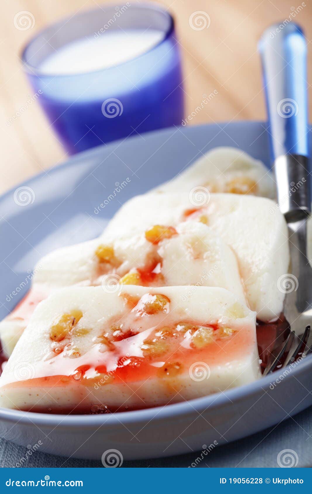 Semolina Pudding with Raisins Stock Photo - Image of pudding, sauce ...