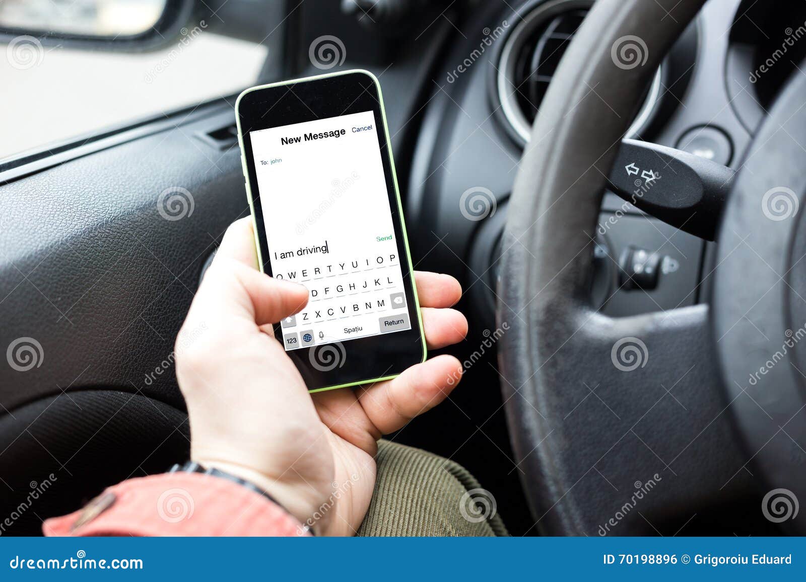 Sending sms while driving stock photo. Image of keyboard - 70198896