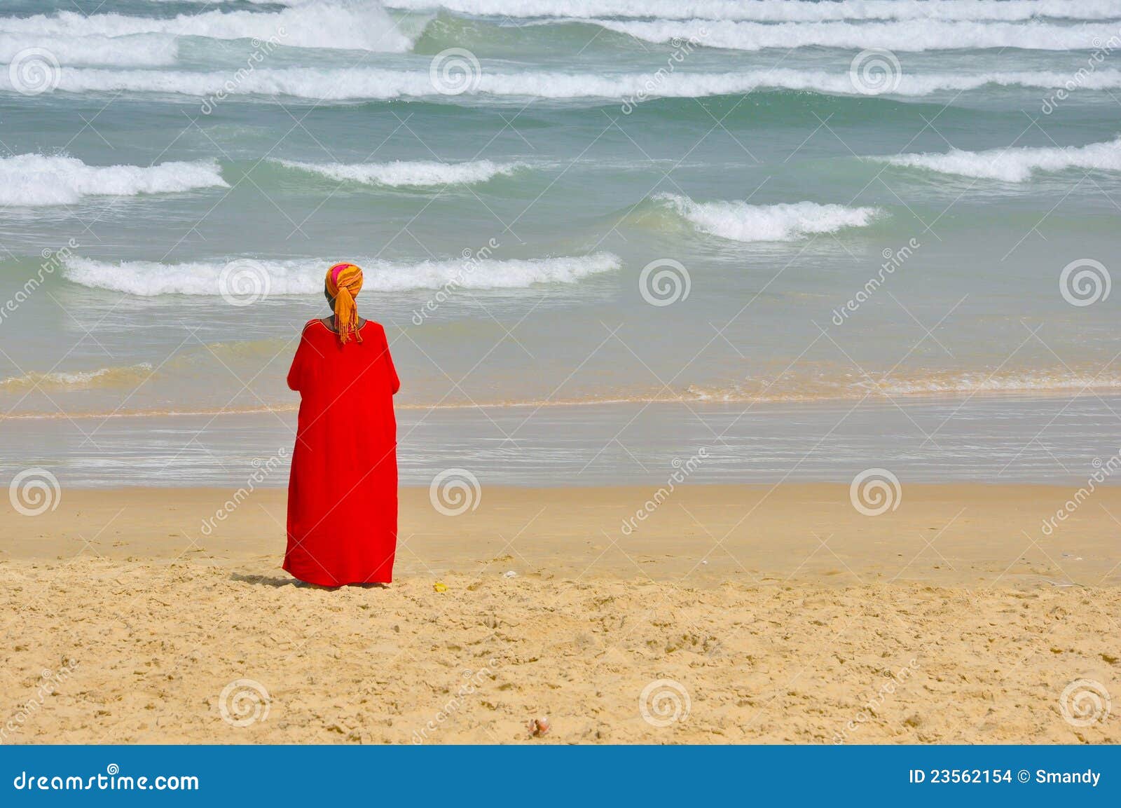 View Of Two Women, Alone On The Beach, Enjoying Sunbathing On The Beach ...