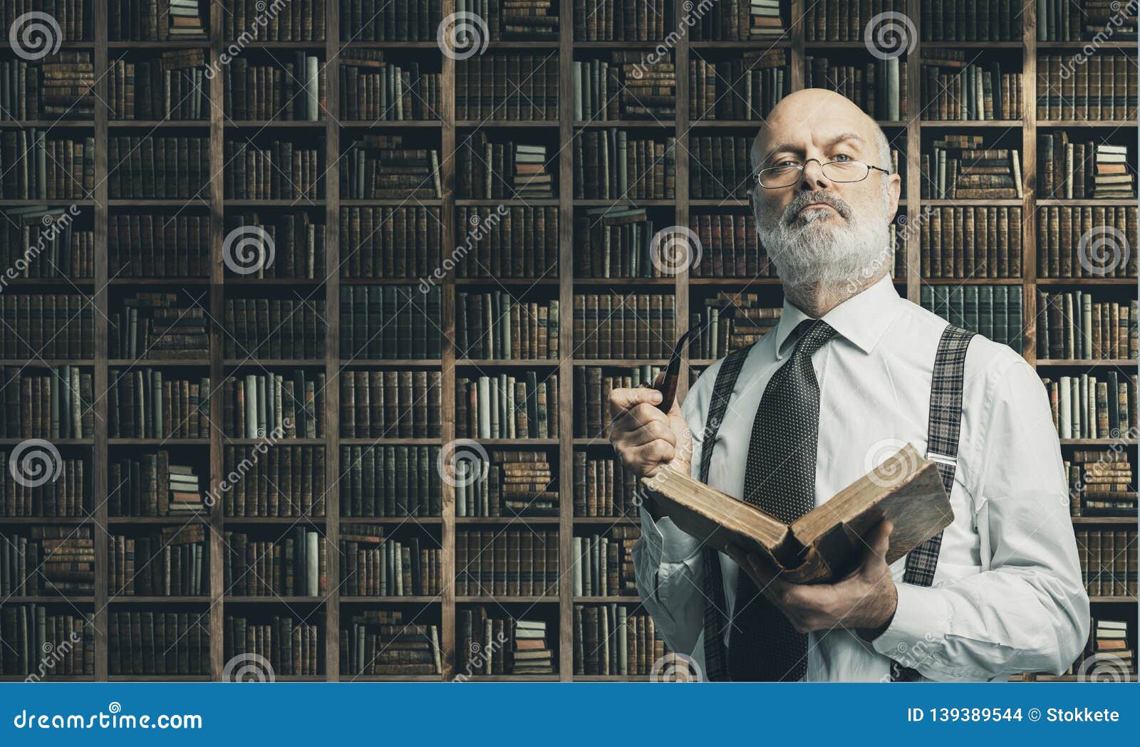 Academic Professor in the Library Holding a Book Stock Photo - Image of ...