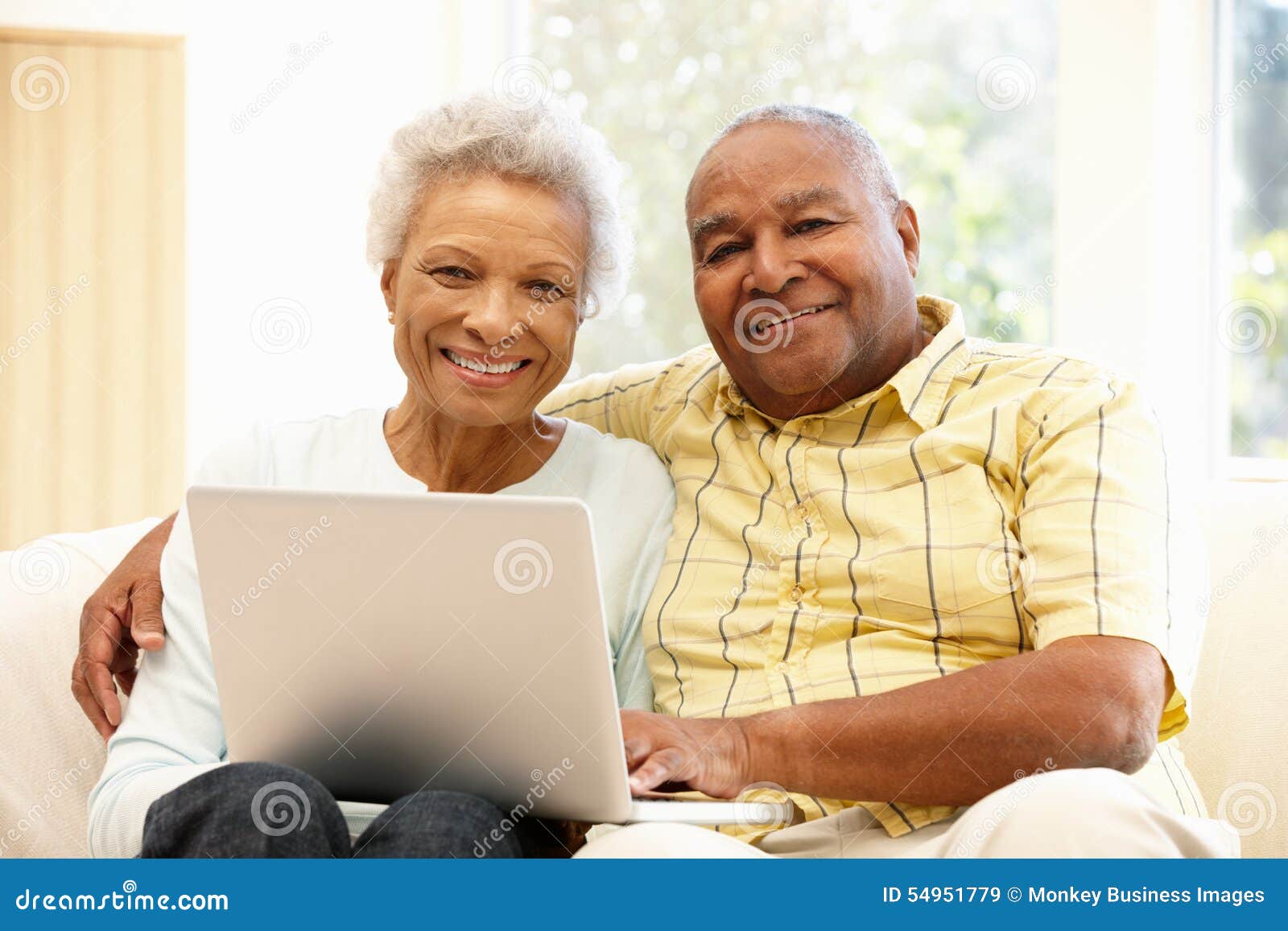 Senior African American Couple Using Laptop Stock Image - Image of ...