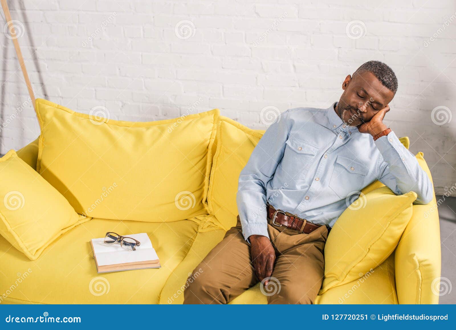 Senior African American Man Sleeping on Couch Book and Eyeglasses Stock ... Senior African American Man Sleeping on Couch Book and Eyeglasses Stock ...