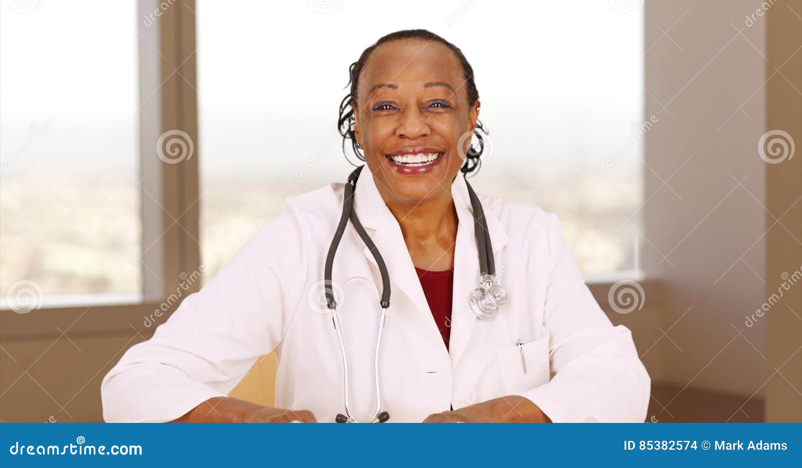 Senior African Doctor Smiling at Camera Stock Photo - Image of facetime ...