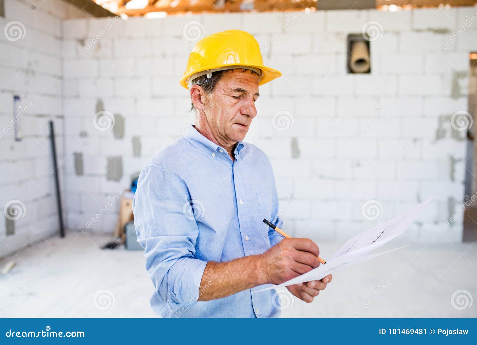 Senior Architect or Civil Engineer at the Construction Site. Stock ...