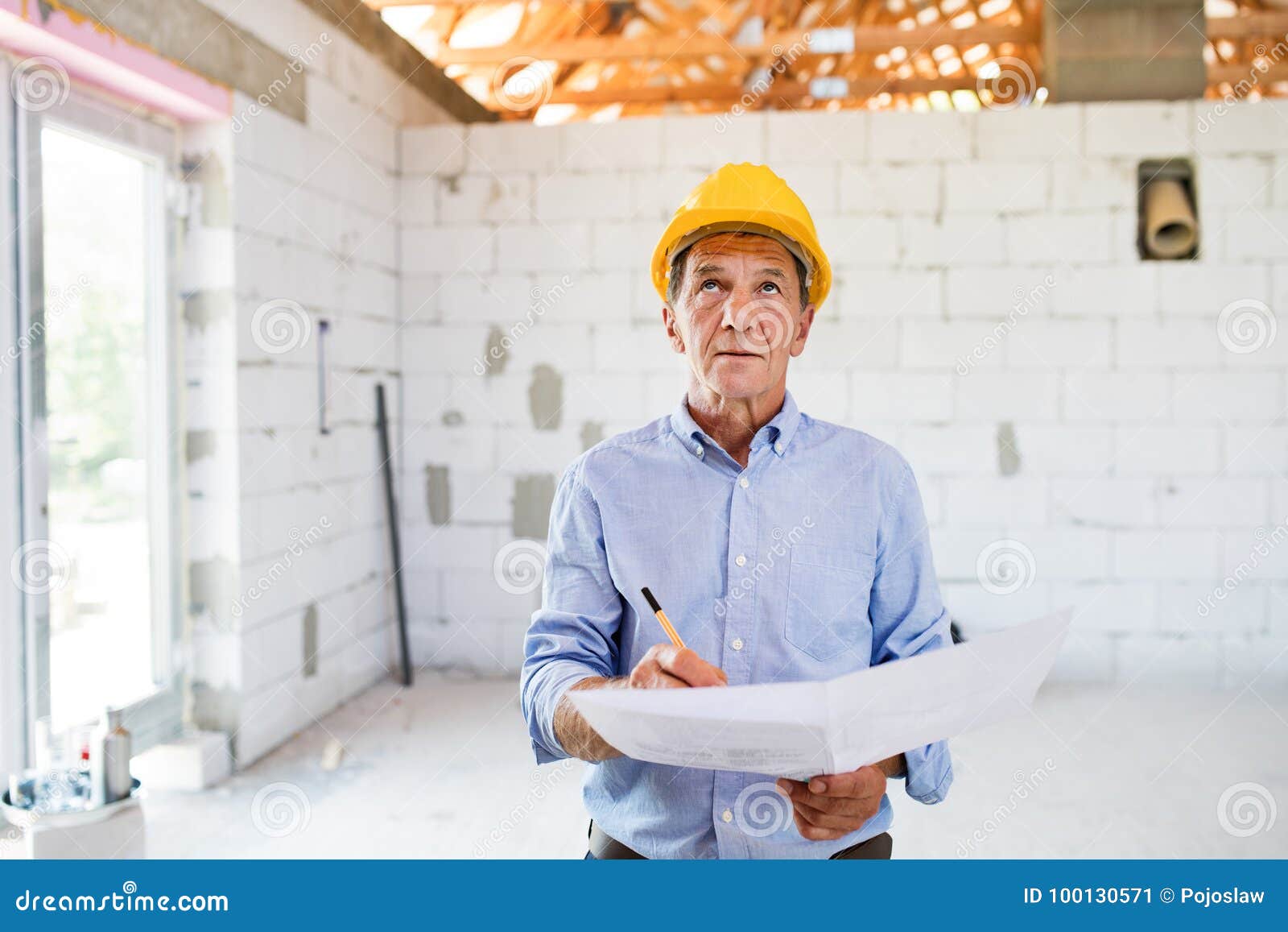 Senior Architect or Civil Engineer at the Construction Site. Stock ...