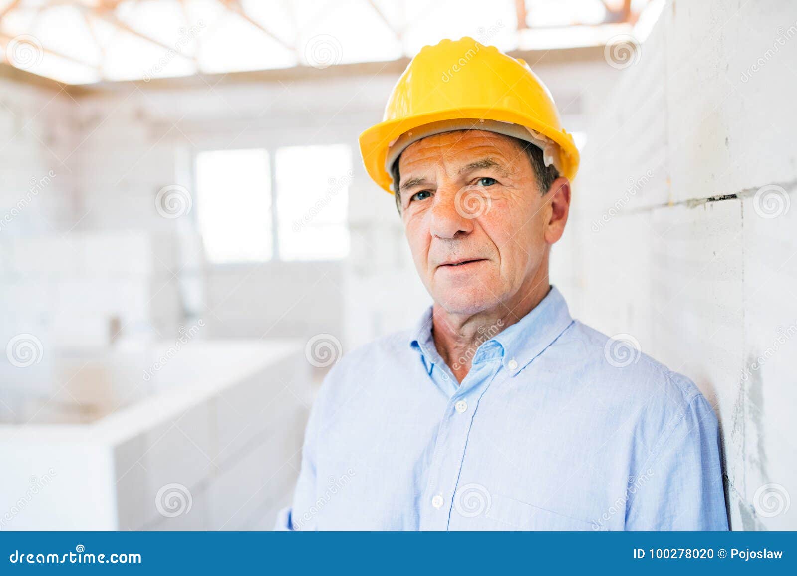 Senior Architect or Civil Engineer on the Construction Site. Stock ...
