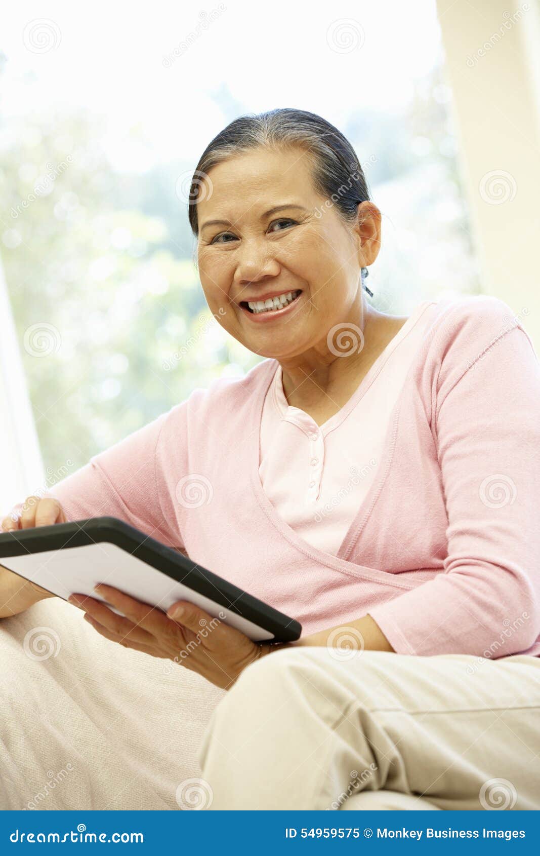 Senior Asian Woman Using Tablet Stock Image - Image of mature, relaxed ...