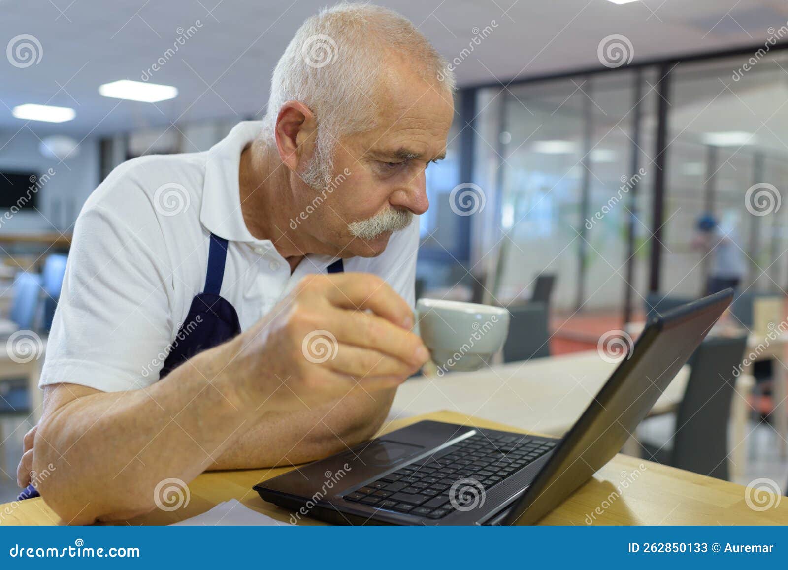 Senior Barman Checking Laptop Stock Image - Image of connected, smiling ...