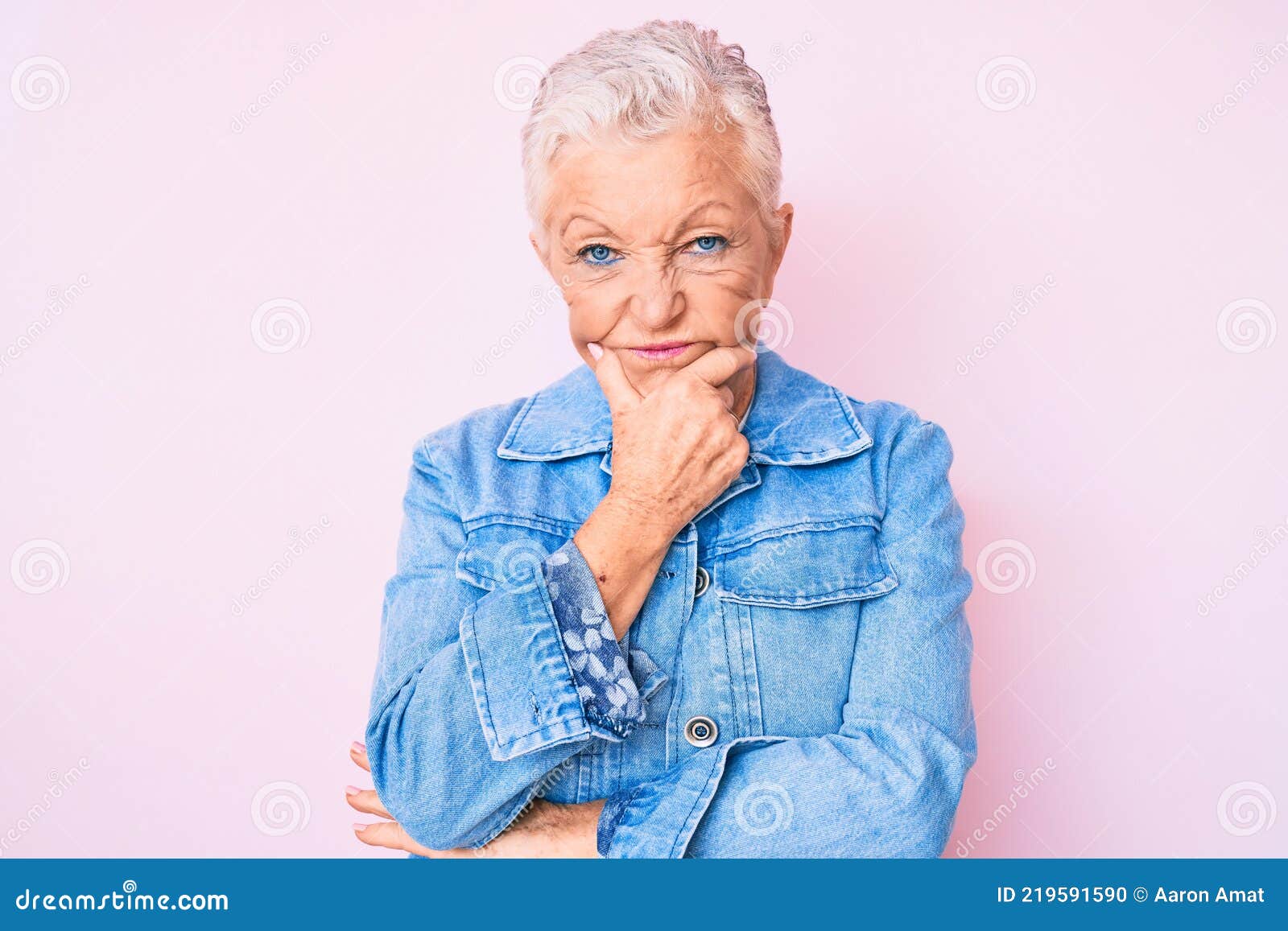 Senior Beautiful Woman With Blue Eyes And Grey Hair Wearing Casual