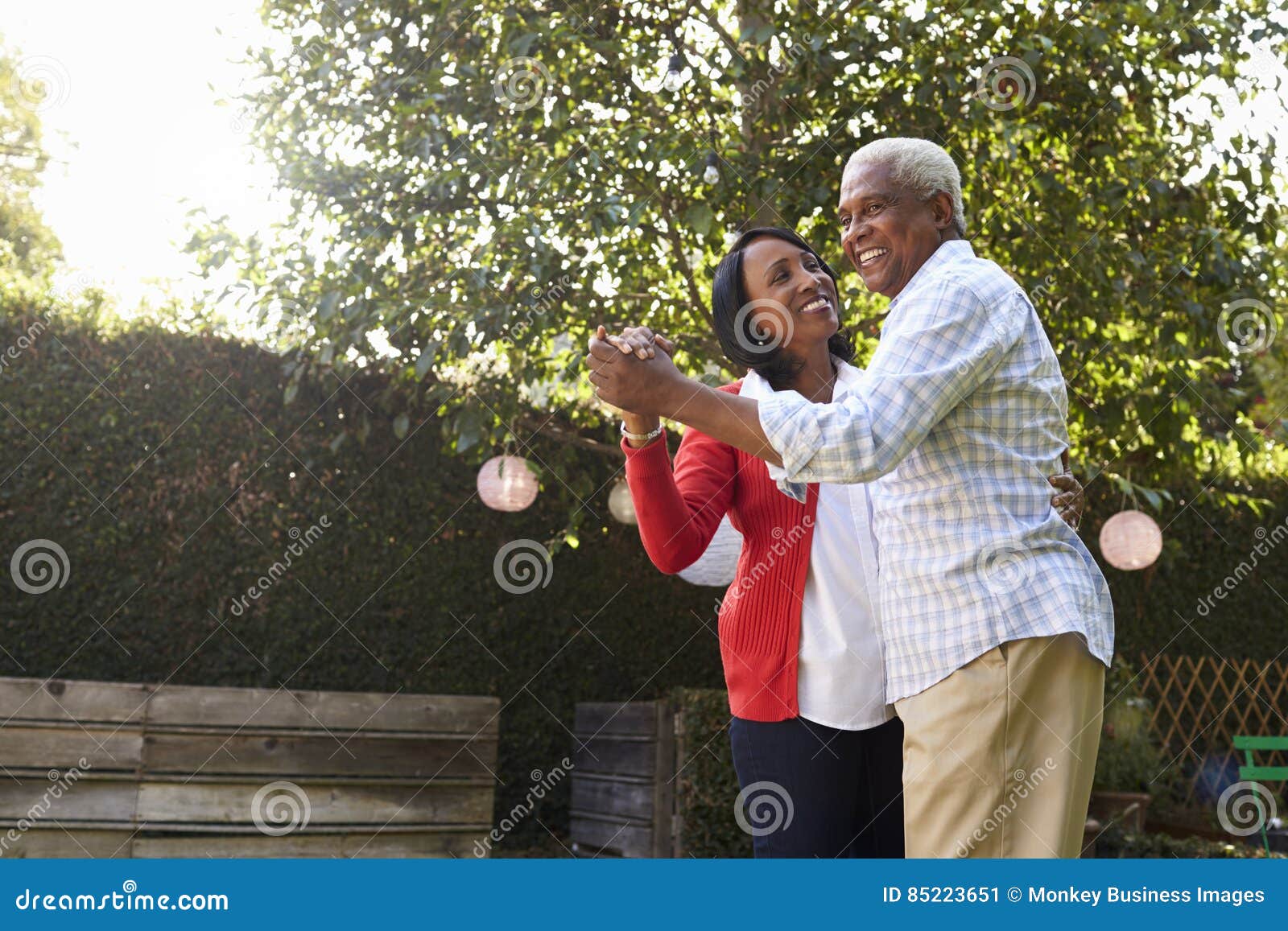 Senior Black Couple Dancing in Their Back Garden Stock Image - Image of ...