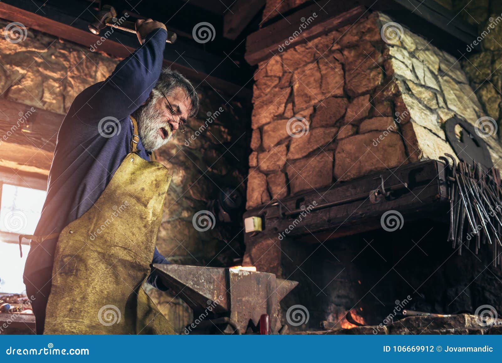 Senior Blacksmith Forge Iron at Work Stock Photo - Image of antique ...
