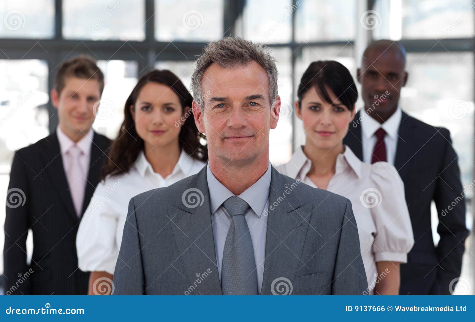 Senior Business Man in Front of Team Stock Photo - Image of modern ...