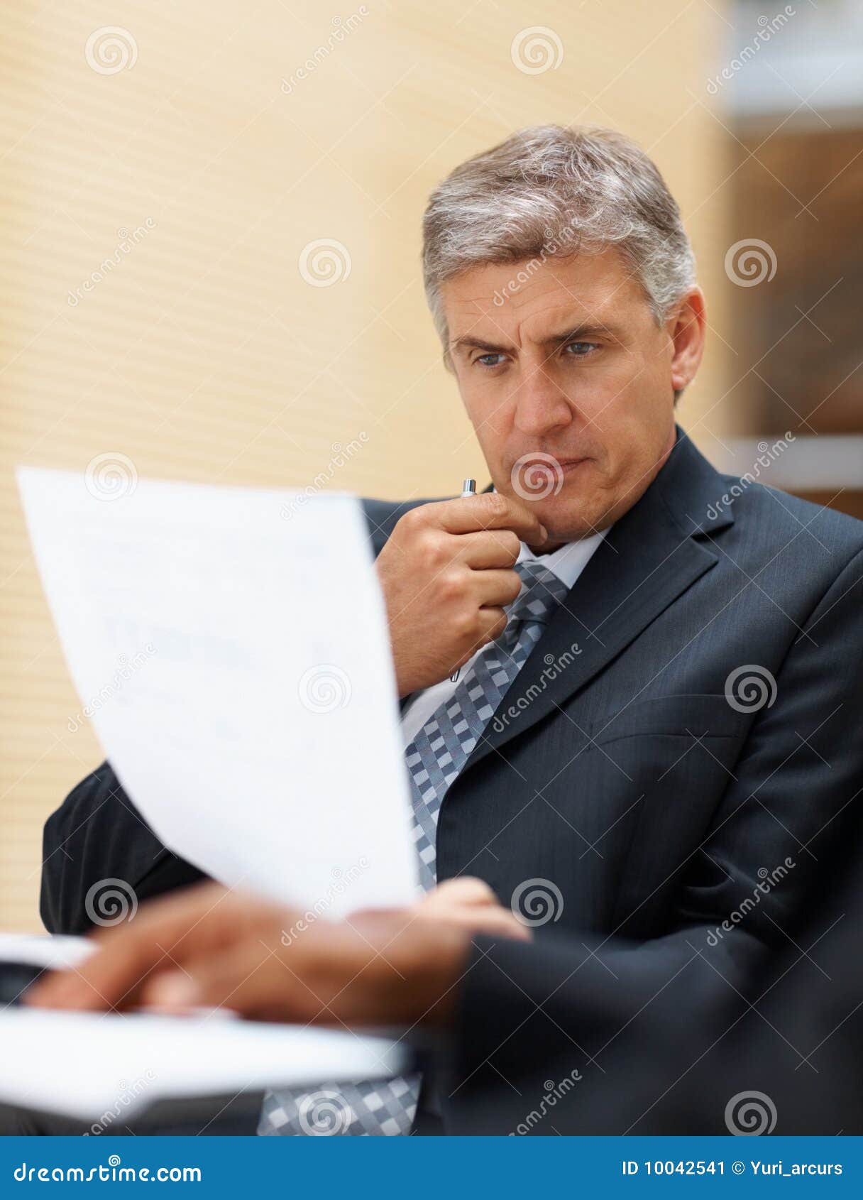 Senior Business Man Going through a Paper Stock Image - Image of ...