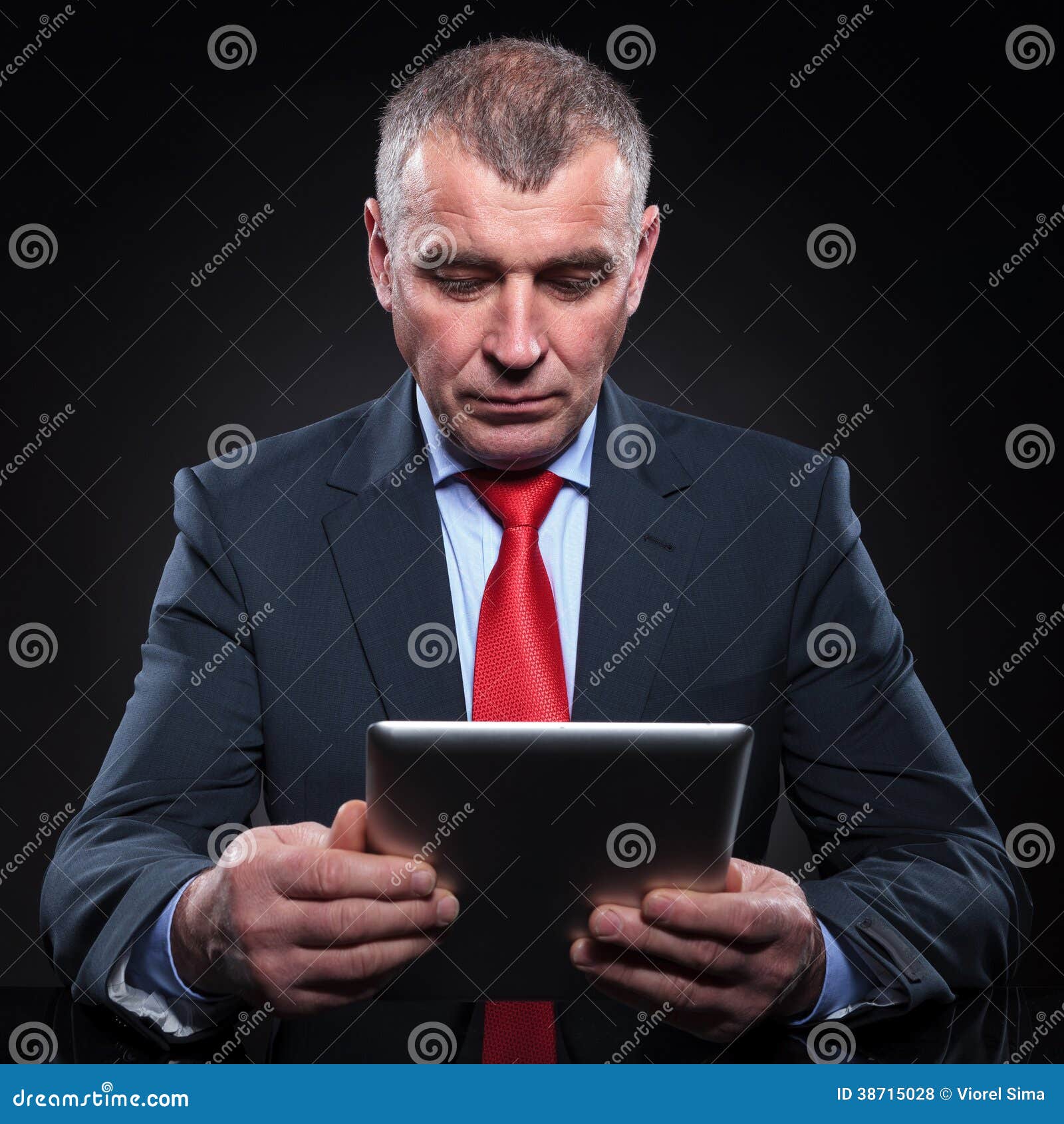 Senior Business Man Reading on Tablet Pad Computer Stock Photo - Image ...