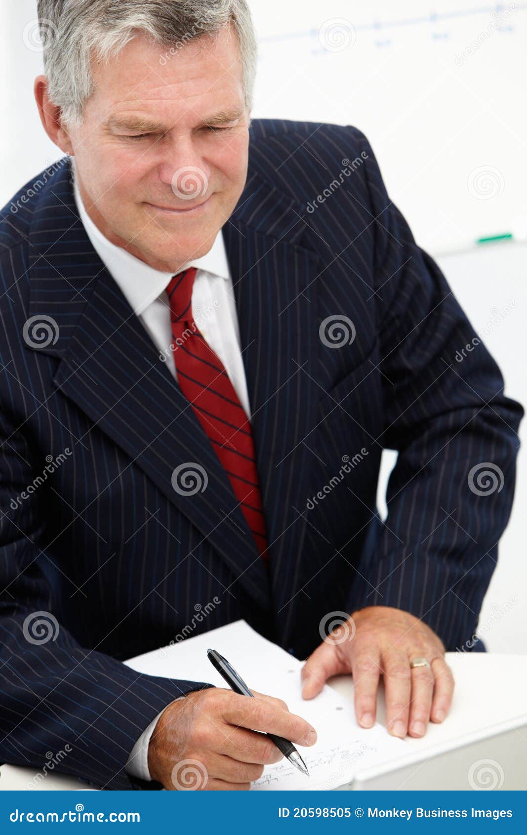 Senior Business Man Taking Notes in Office Stock Image - Image of ...