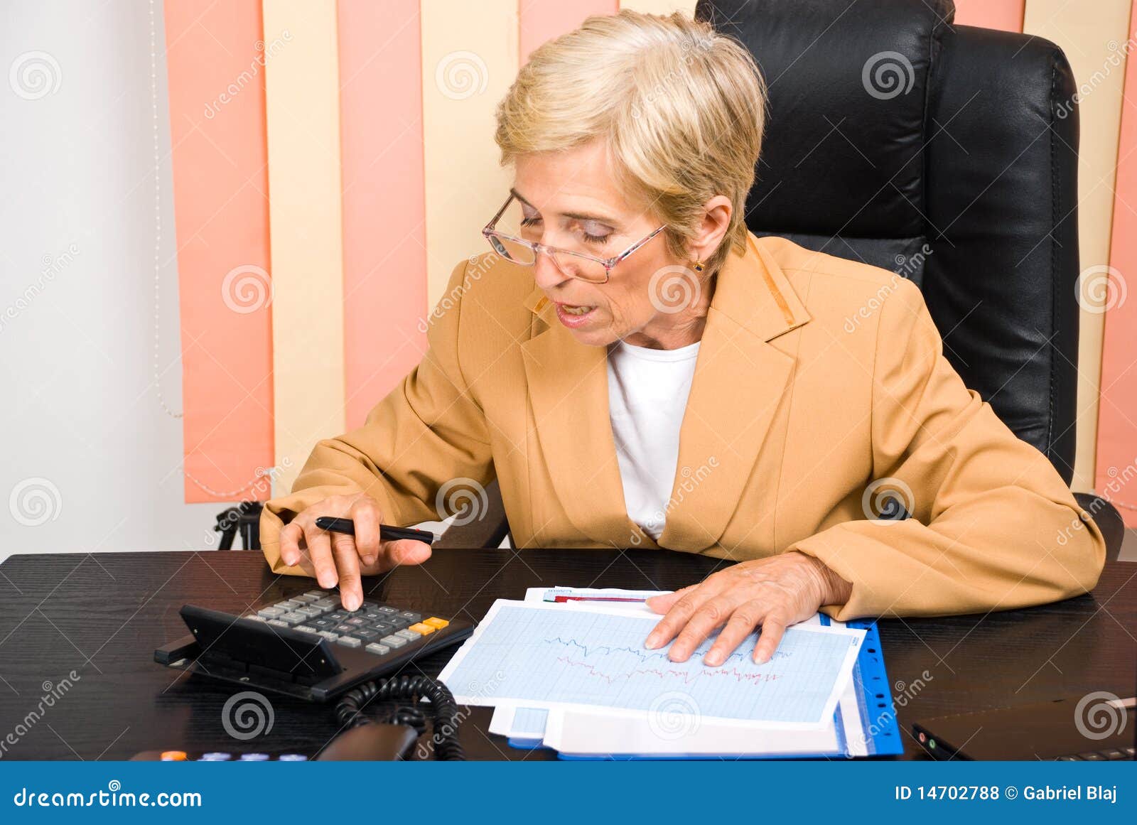 Senior Business Woman Using Calculator in Office Stock Photo - Image of ...