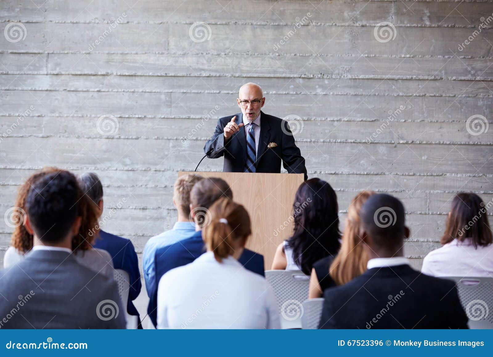 Senior Businessman Addressing Delegates at Conference Stock Photo ...