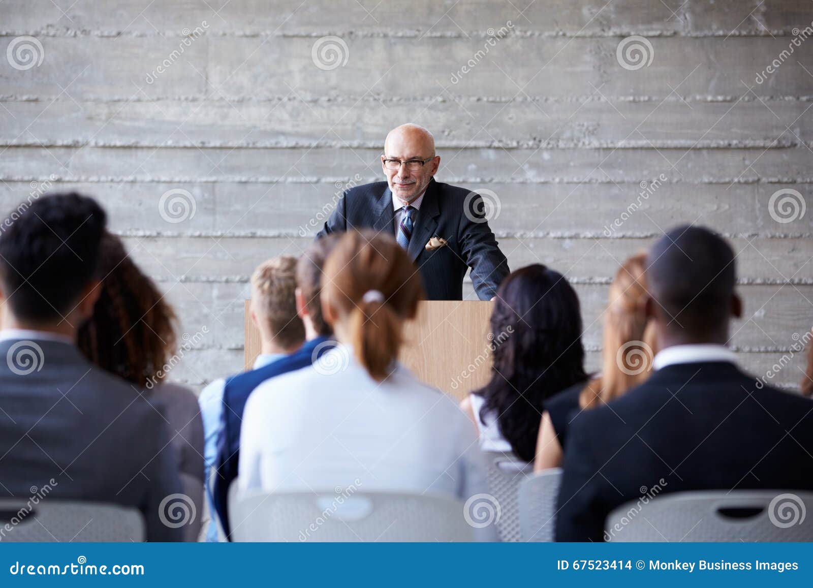 Senior Businessman Addressing Delegates at Conference Stock Photo ...