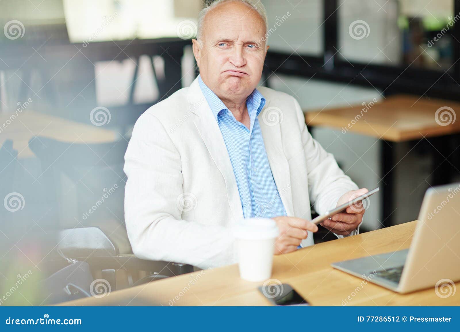 Senior businessman in cafe stock photo. Image of skeptical - 77286512 Senior businessman in cafe stock photo. Image of skeptical - 77286512