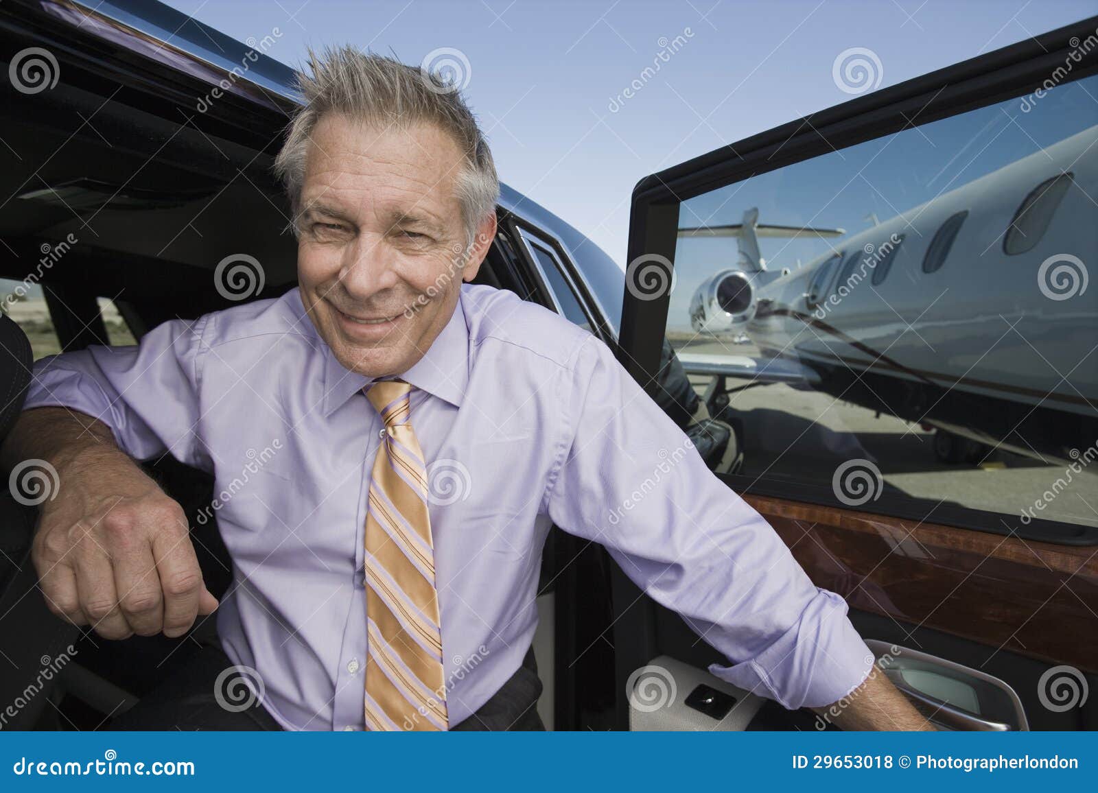Senior Businessman Getting Down from Car Stock Photo - Image of ...
