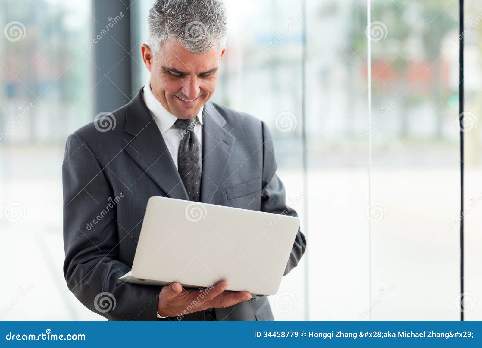 Senior businessman laptop stock image. Image of grey - 34458779