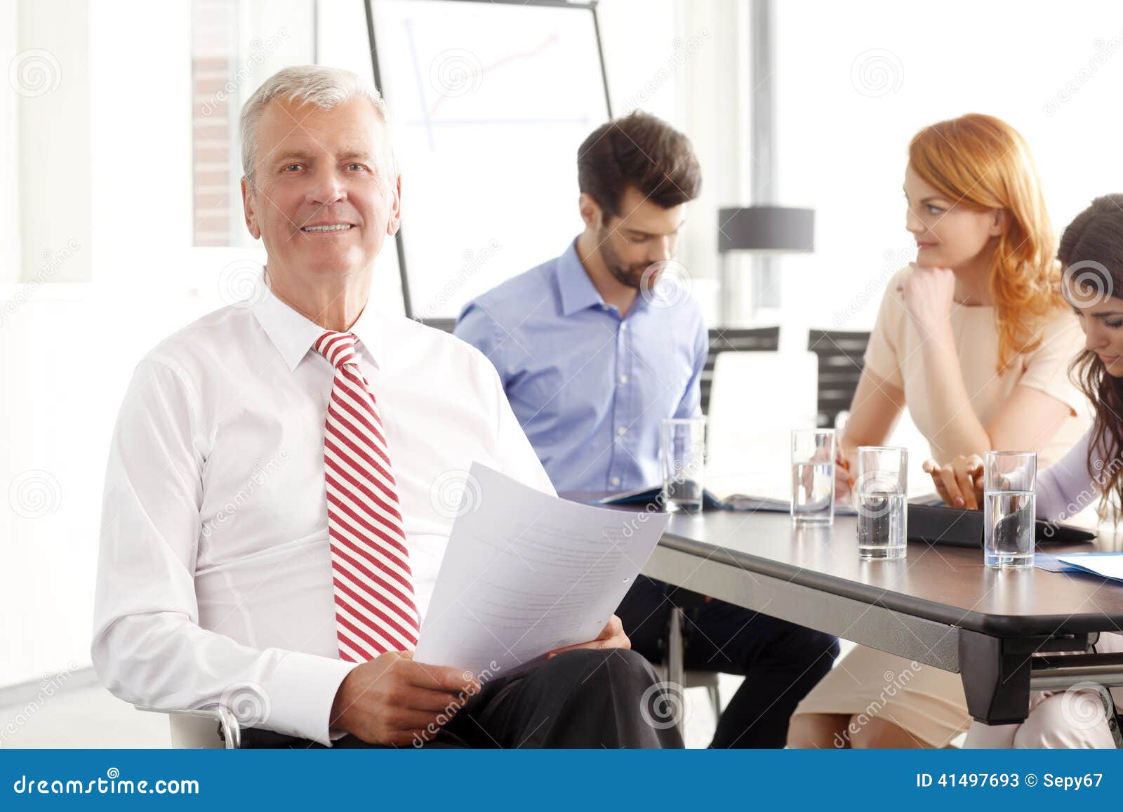 Senior Businessman Sitting at Meeting Stock Image - Image of female ...