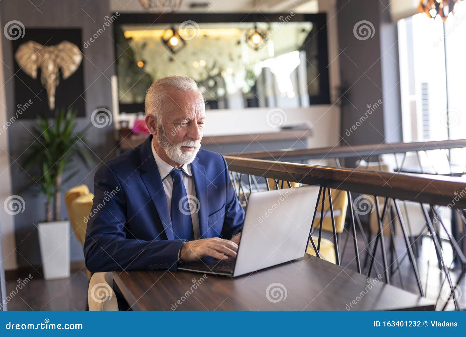 Senior Businessman Typing a Report Stock Photo - Image of entrepreneur ...